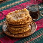 Buñuelos with Piloncillo Syrup - Nibbles and Feasts